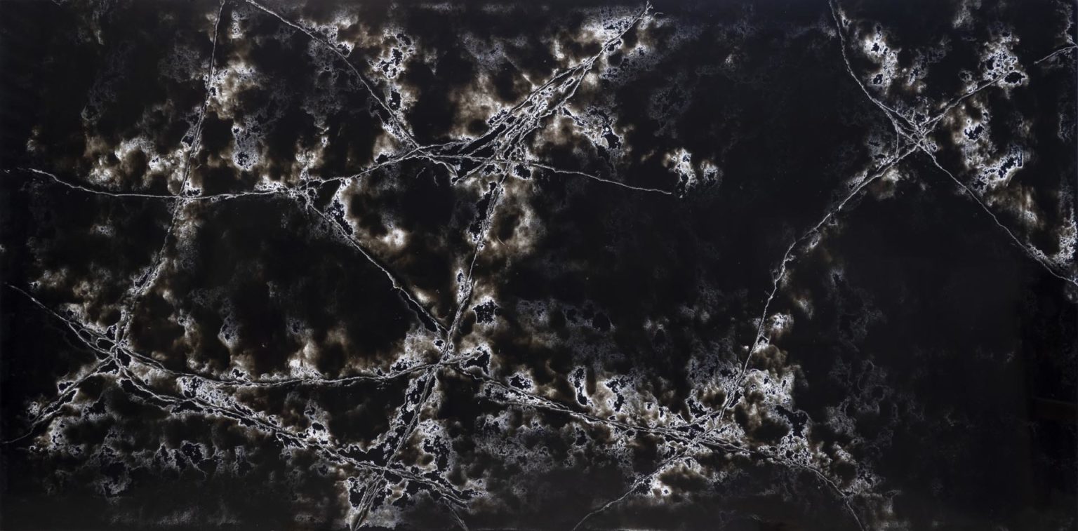 INTO THE BLACK: BLACK AND GOLD MARBLE-LOOK QUARTZ