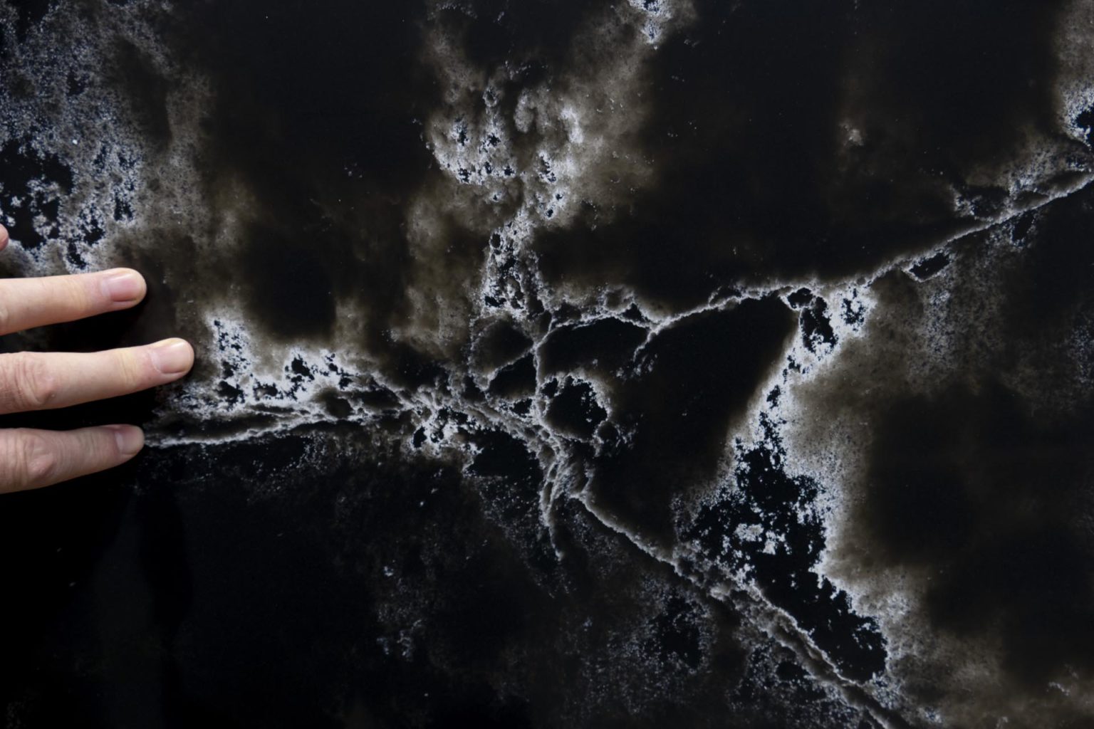 INTO THE BLACK: BLACK AND GOLD MARBLE-LOOK QUARTZ